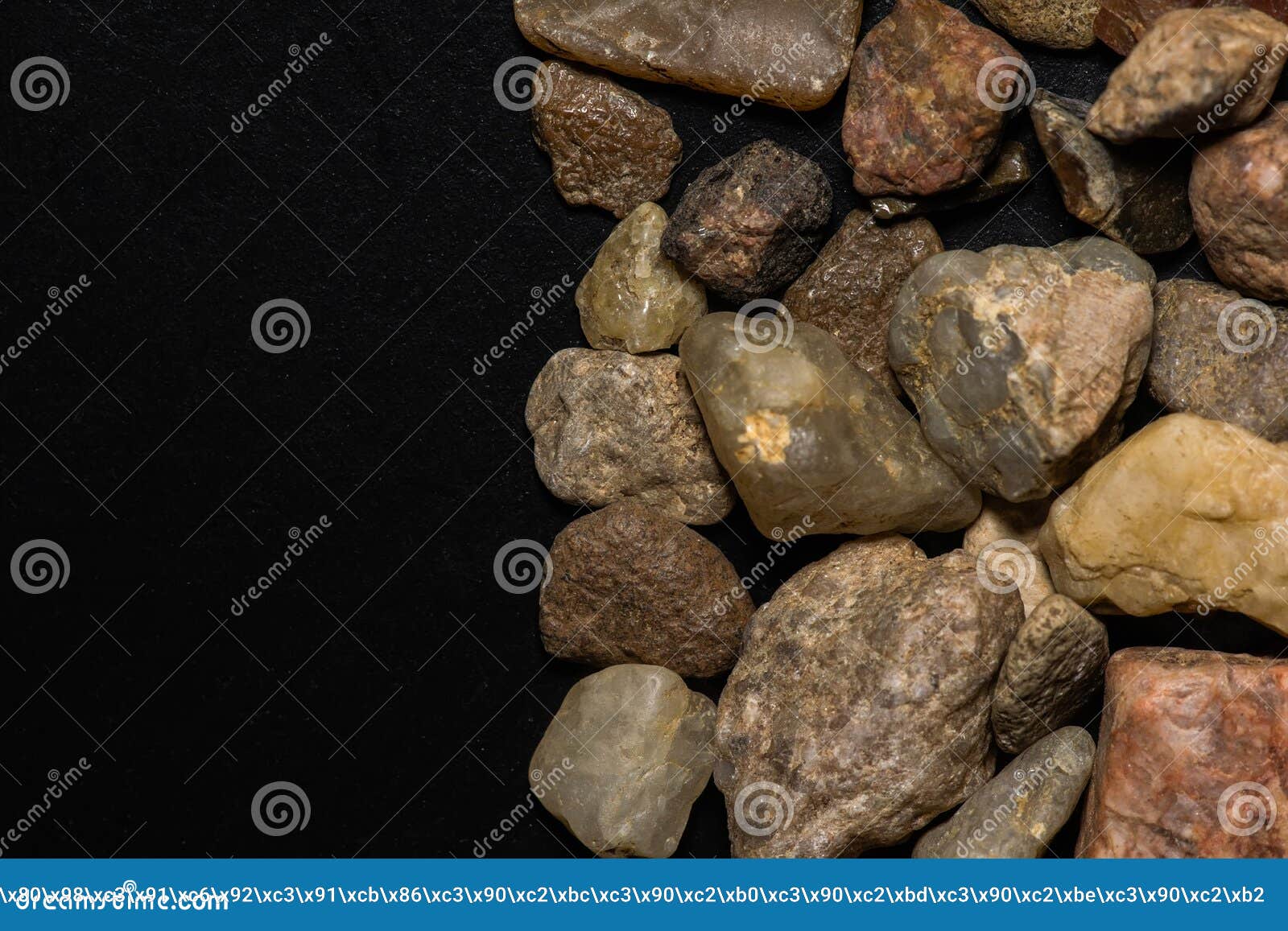 Multicolored Stones in Close-up on a Black Background Stock Photo ...