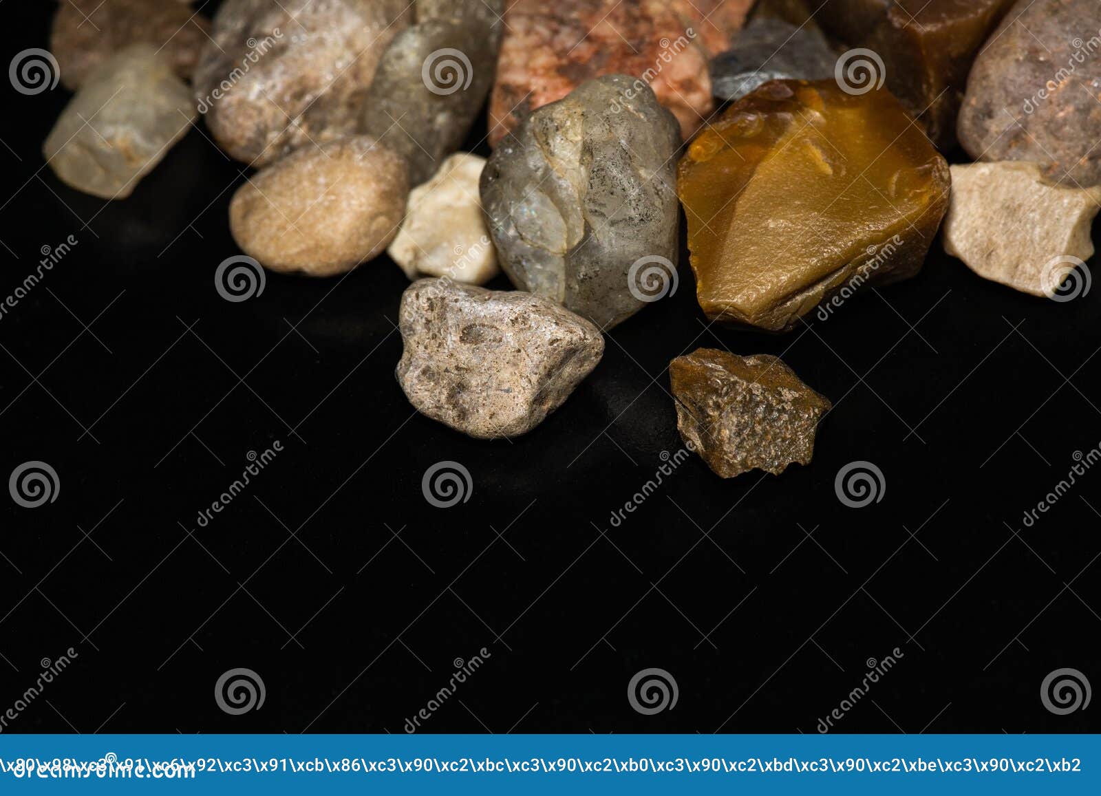 Multicolored Stones in Close-up on a Black Background Stock Image ...