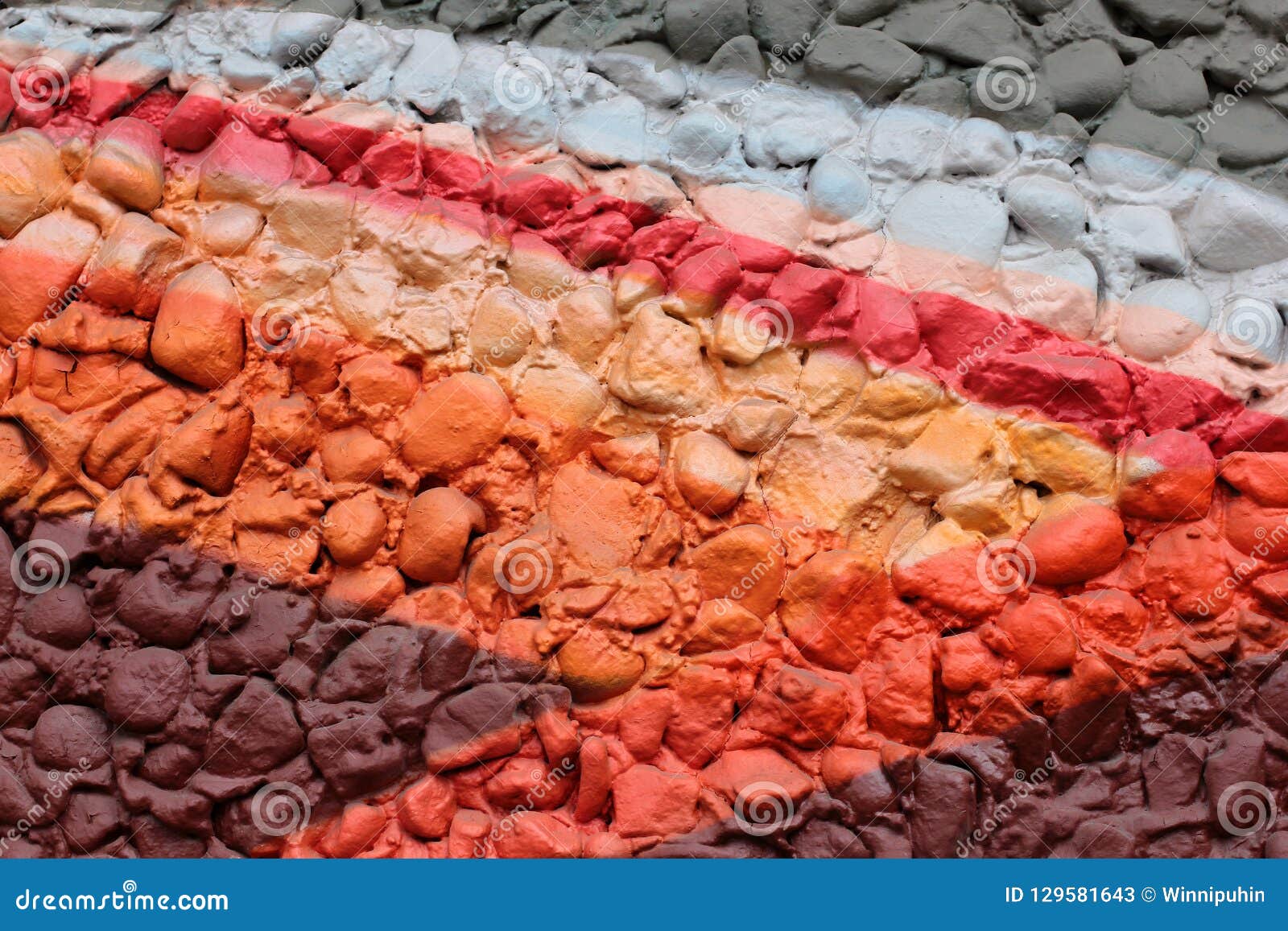 Multicolored Stones. the Wall is Painted in Different Colors in Texture ...