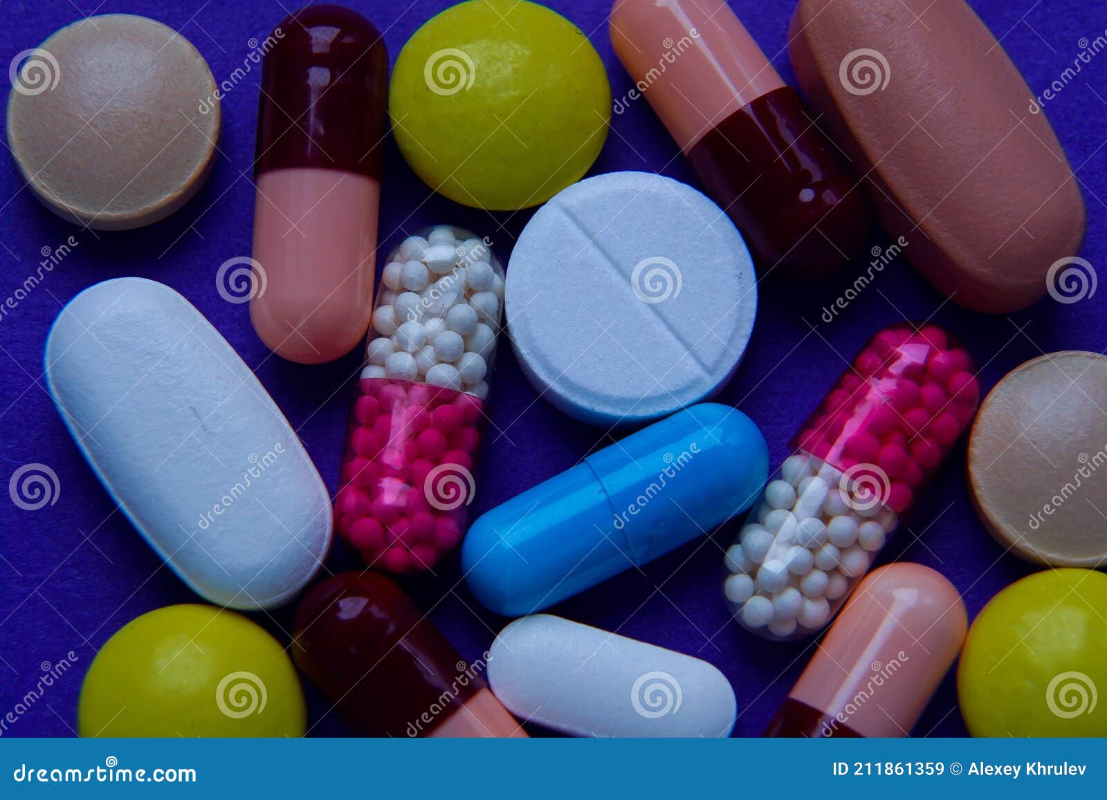 Tablets of Different Colors and Sizes are Laid Out on a Blue Background ...