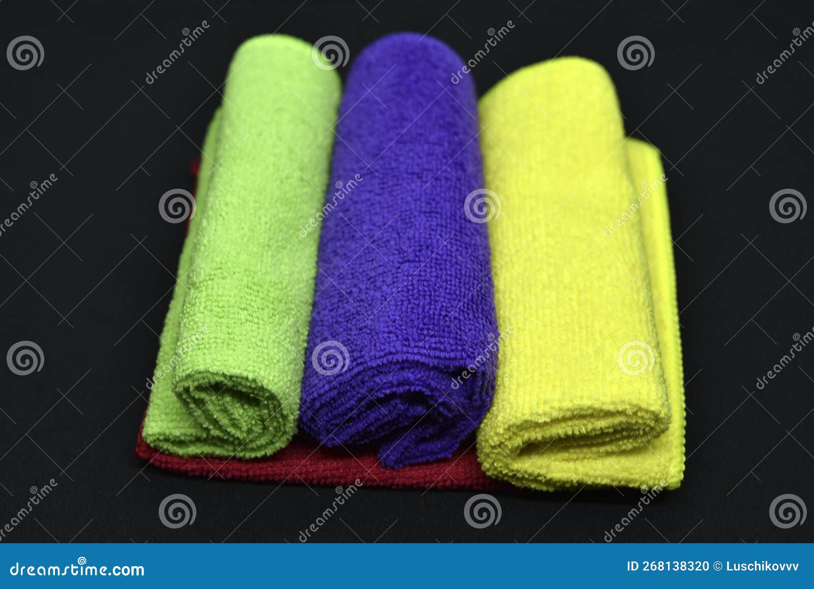 Multicolored Towels on a Black Background. Terry Towels. Colored Rags ...