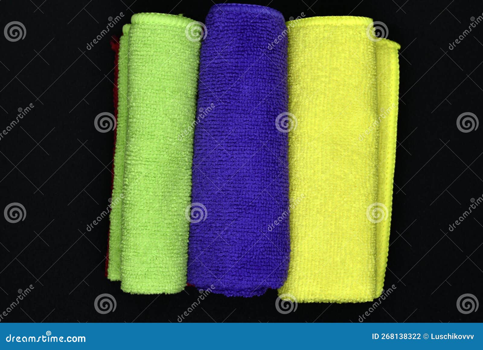 Multicolored Towels on a Black Background. Terry Towels. Colored Rags ...