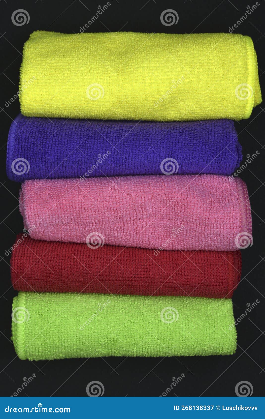 Multicolored Towels on a Black Background. Terry Towels. Colored Rags ...