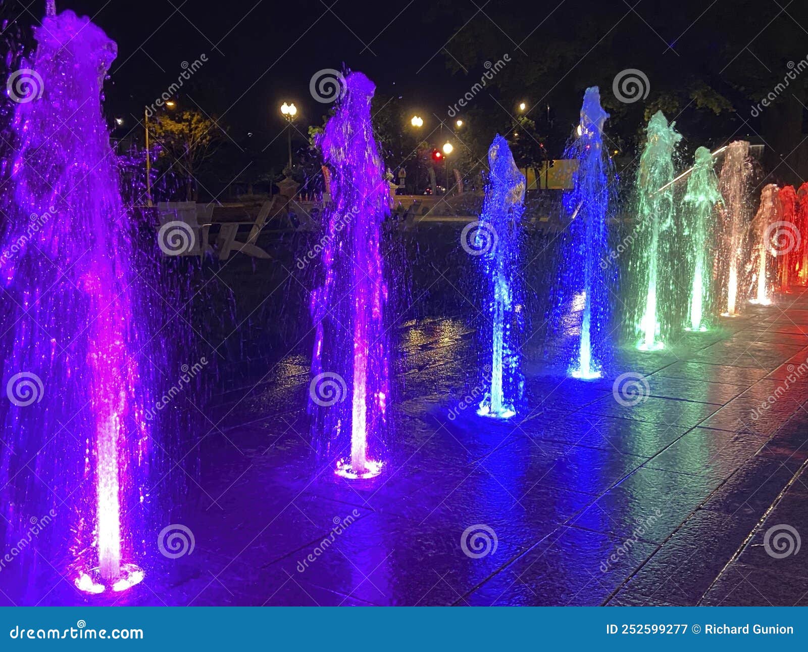 Multicolored Water Fountain Light Display at Night Stock Image - Image ...