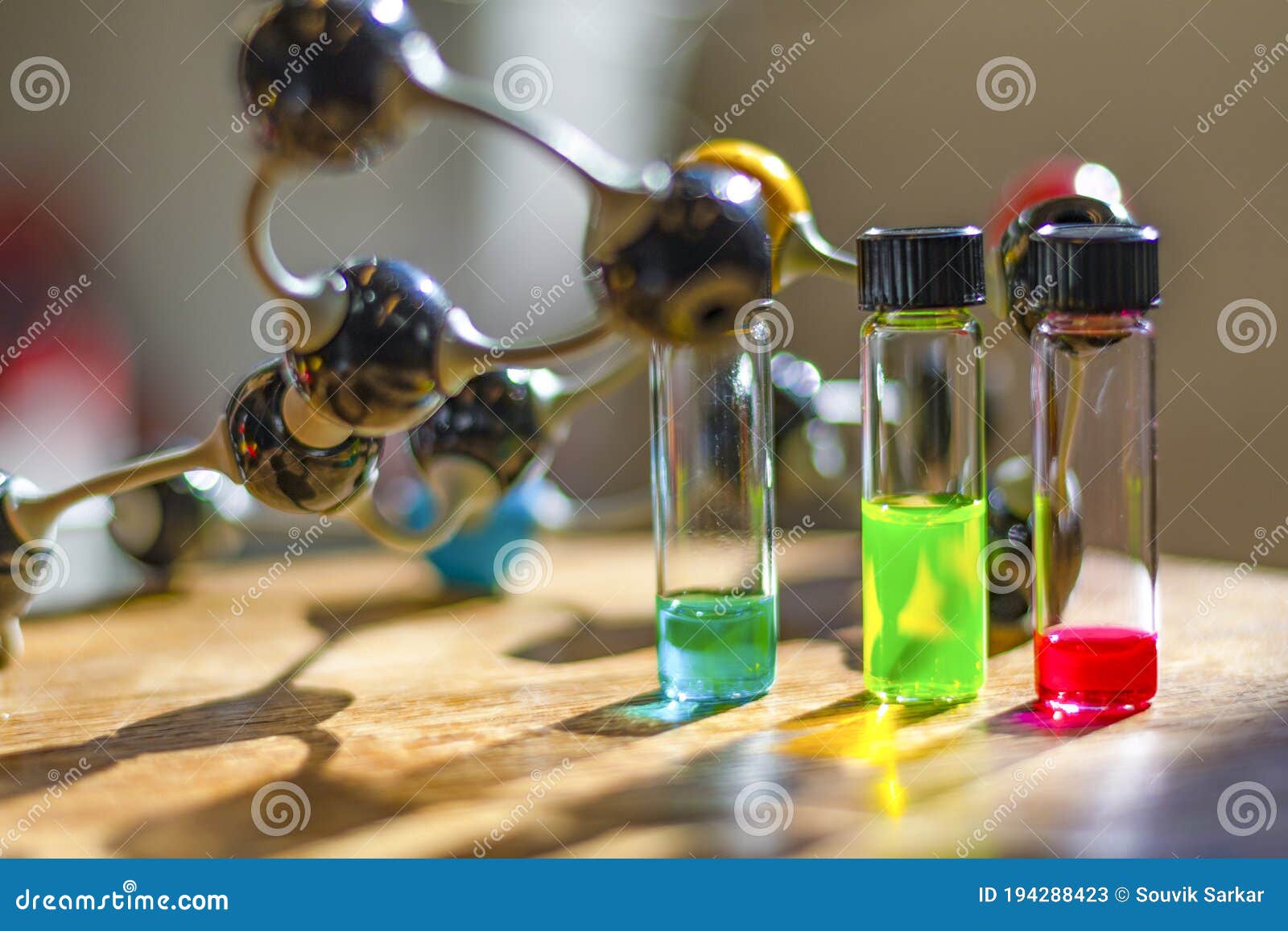 Multicolour Solutions in Different Vials with Capillary Under the Light ...