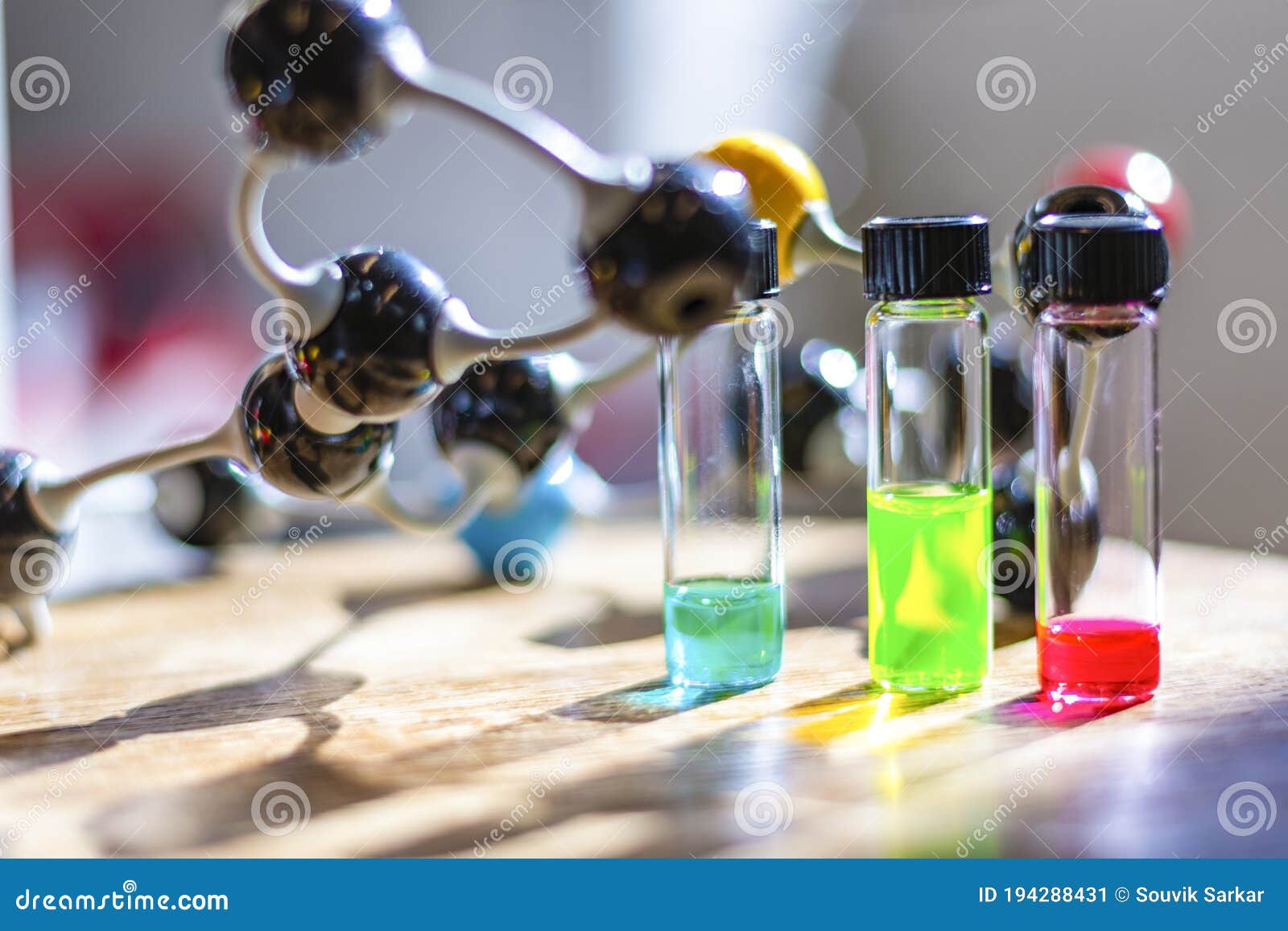 Multicolour Solutions in Different Vials Under the Light with Molecule ...