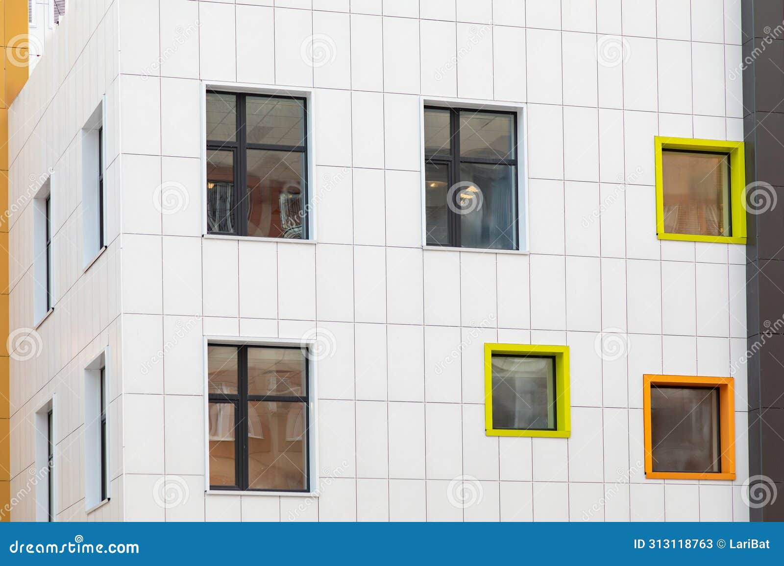 Multicoloured Windows of Different Sizes on White Wall with Ventilated ...