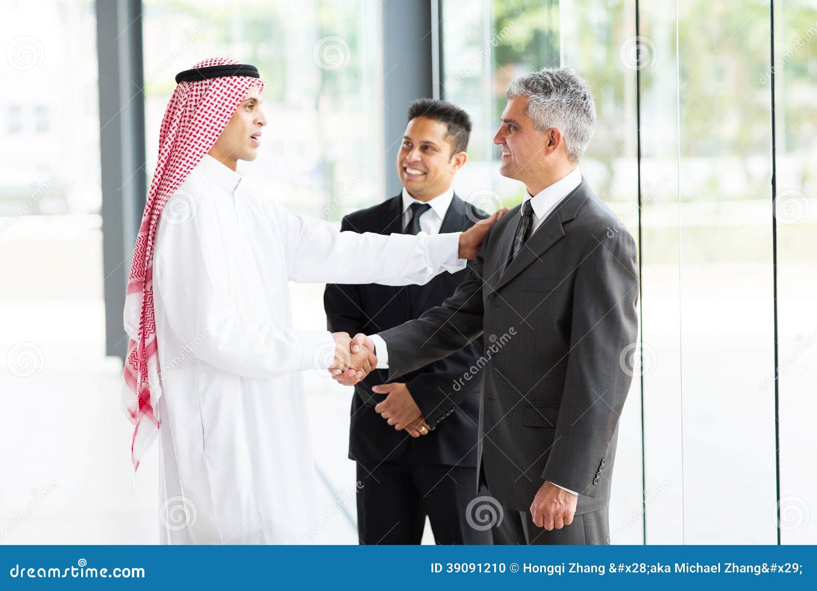 Multicultural Business Partners Handshaking Stock Photo - Image of ...