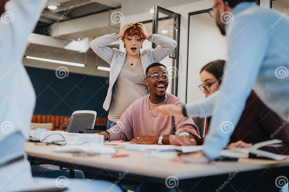 Multicultural Business Team Celebrating Successful Completion of a ... Multicultural Business Team Celebrating Successful Completion of a ...