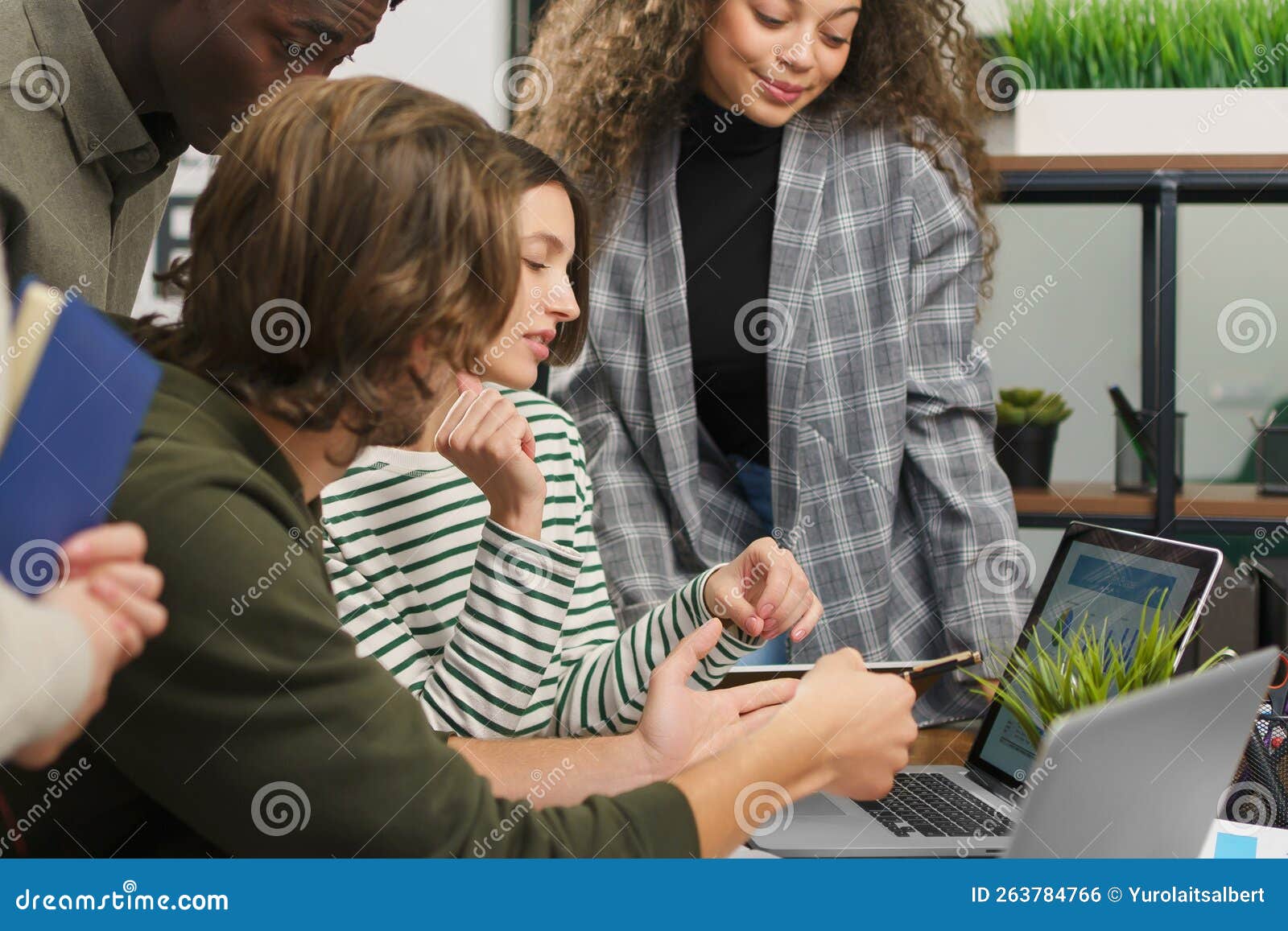 Multicultural Business Team Discussing Current Tasks for a New Project ...