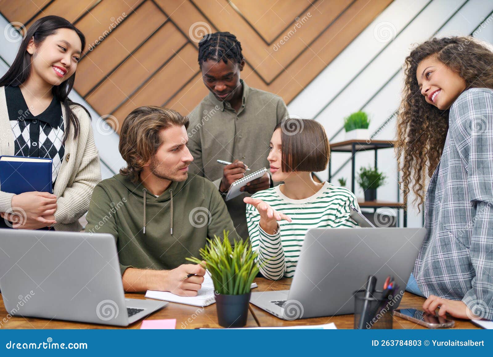 Multicultural Business Team Discussing Current Tasks for a New Project ...