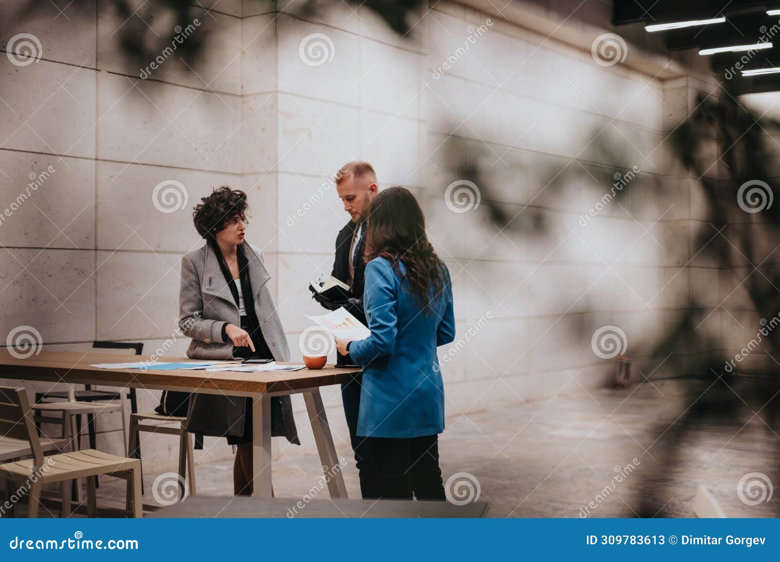 Multicultural Business Team Engaging in a Serious Business Discussion ...