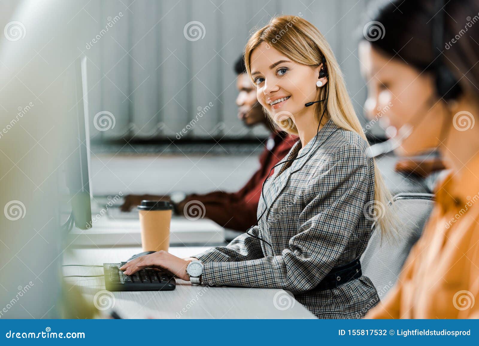Multicultural Call Center Operators with Headsets at Workpalce Stock ...