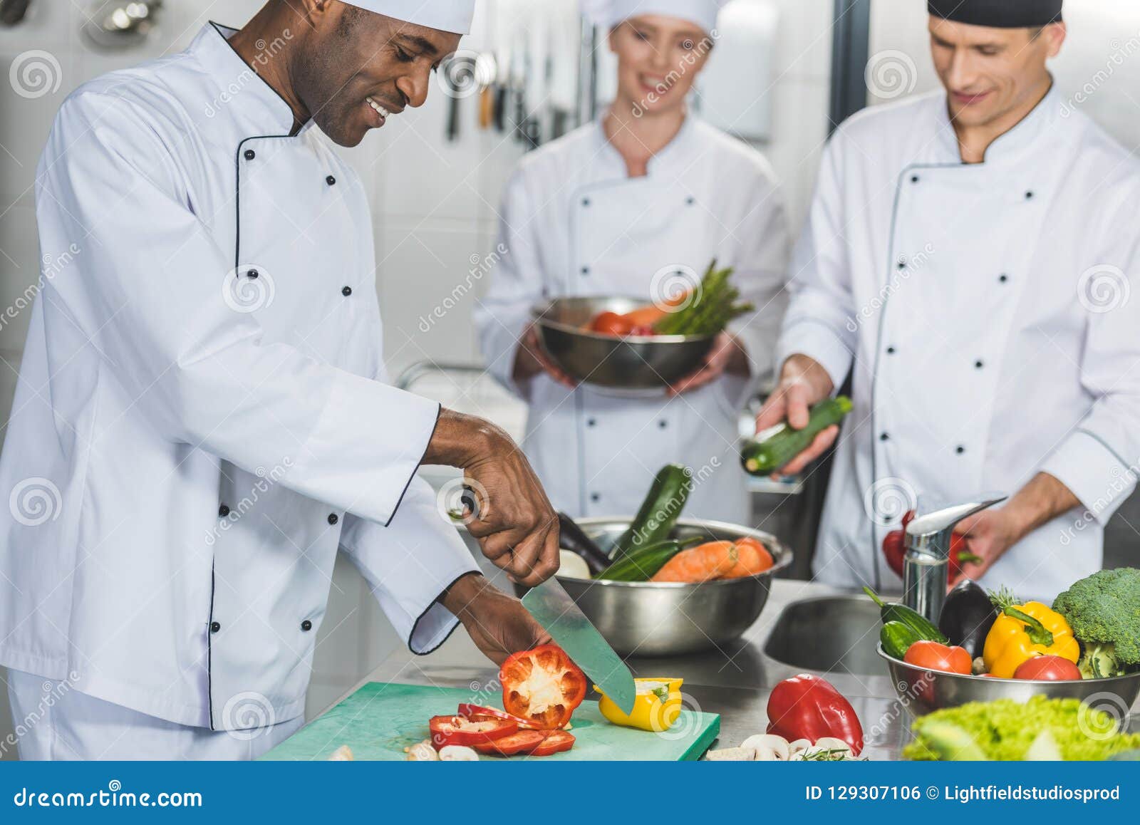 Multicultural Chefs Cooking Salad Stock Photo - Image of appetizing ...