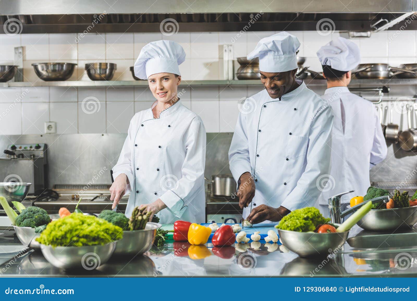 Multicultural Chefs Cutting Vegetables Stock Photo - Image of cafe ...
