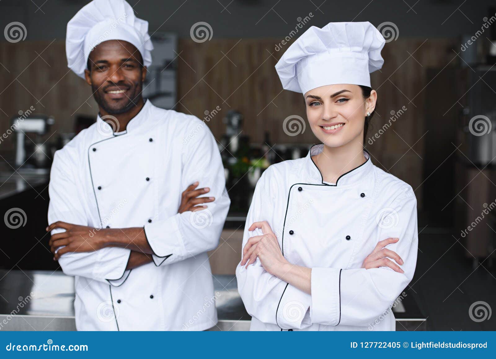 Multicultural Chefs Standing with Crossed Arms and Looking at Camera ...