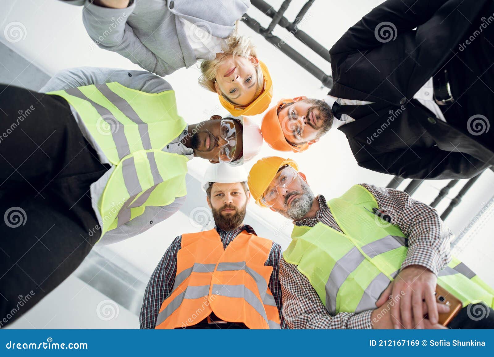 Multicultural Construction Team in Protective Helmet at Work Stock ...