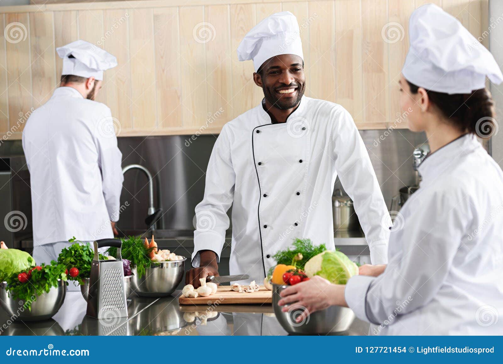 Multicultural Cooks Working Together Stock Photo - Image of male, toque ...