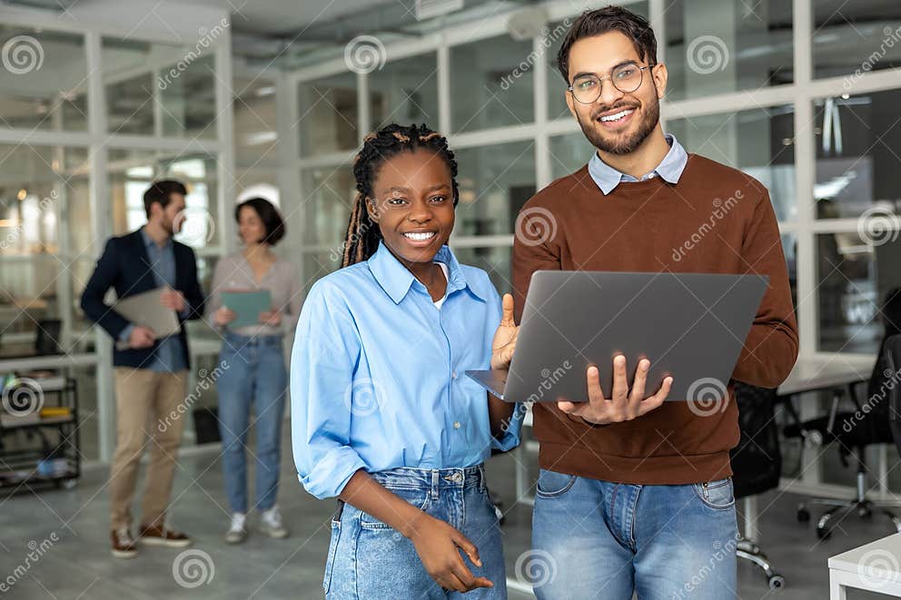 Multicultural Coworkers Working on Project Together Stock Photo - Image ...