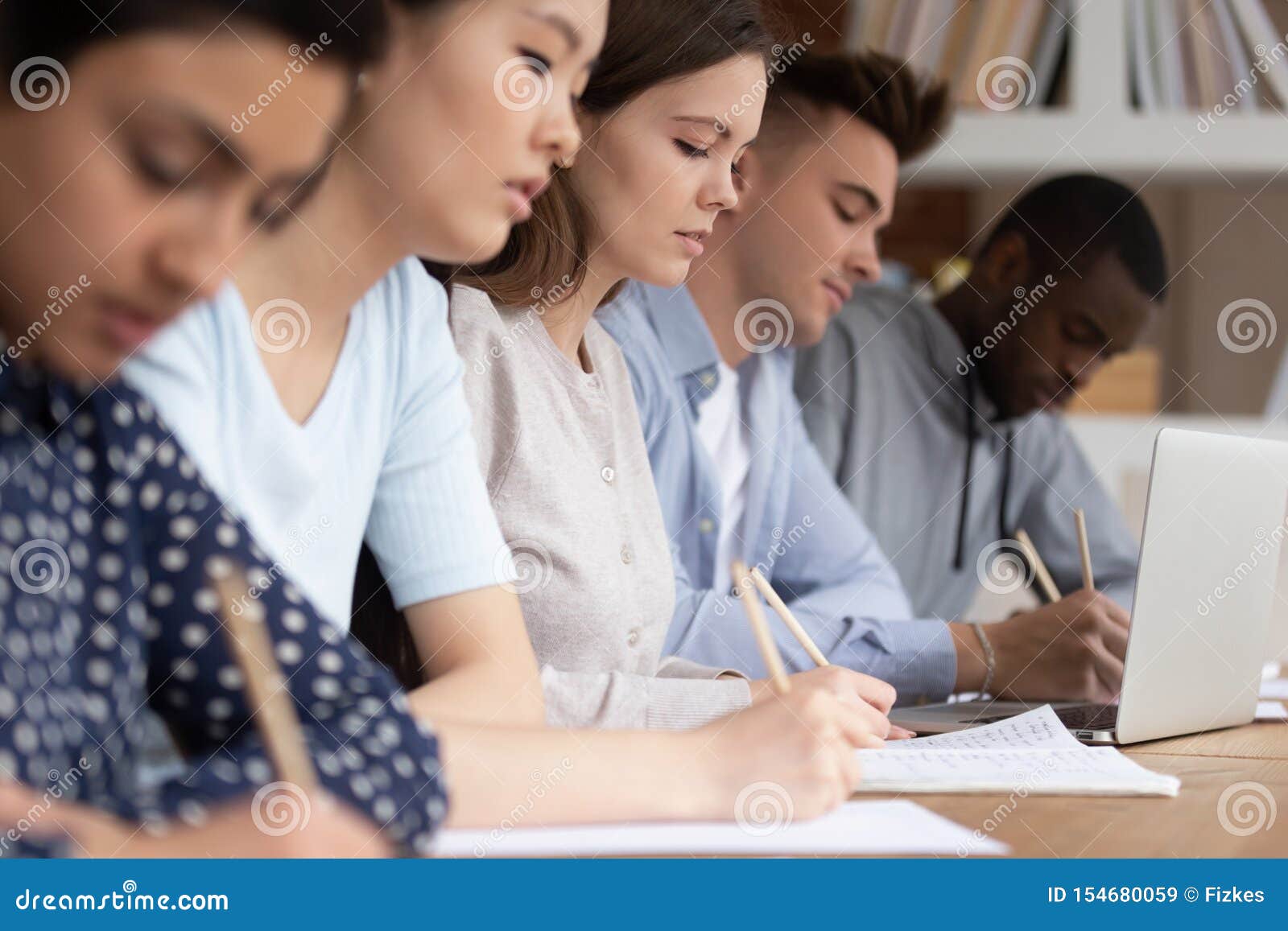 Multicultural Students Make Notes during College Lecture Stock Image ...