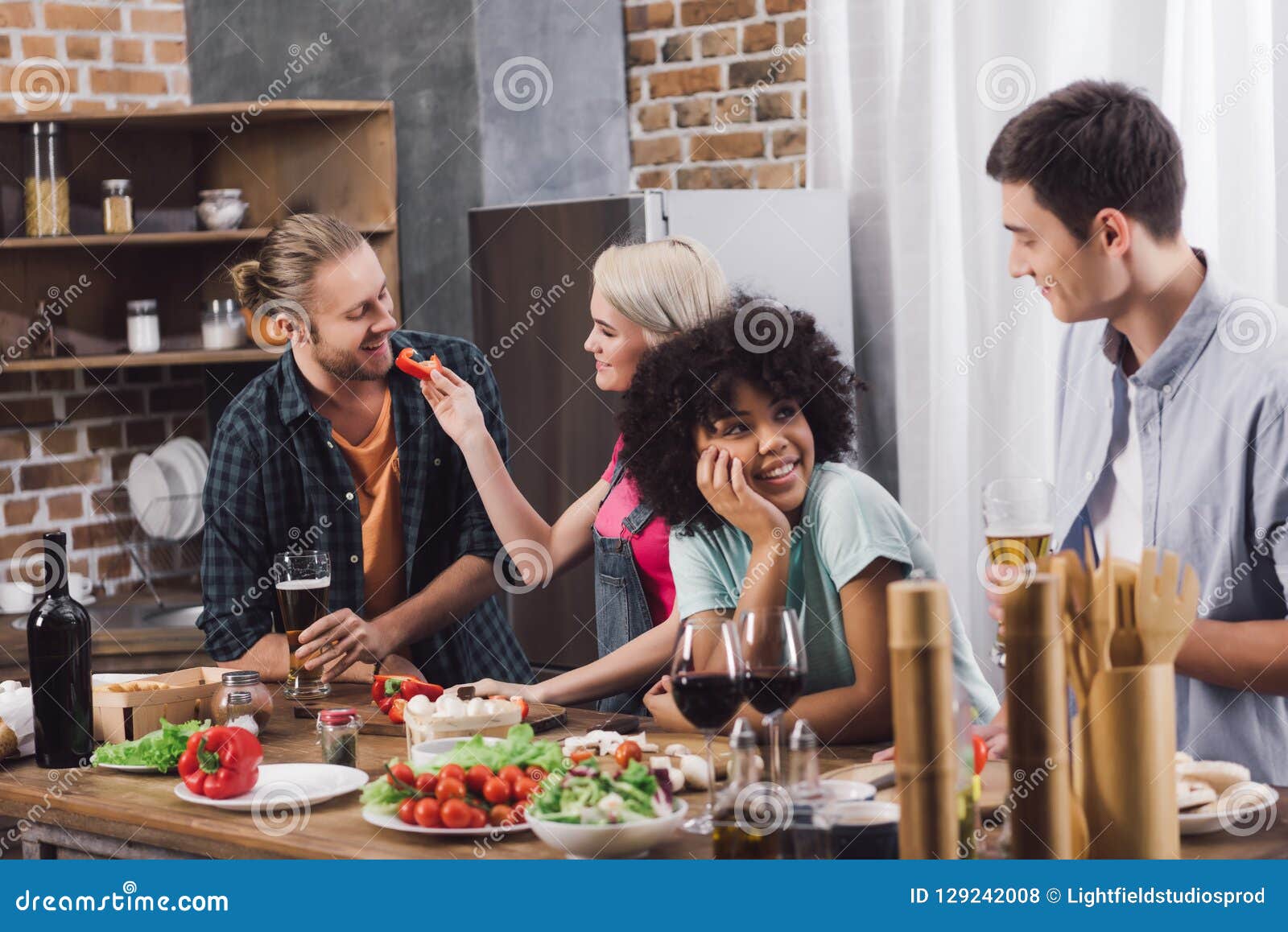 Multicultural Friends Eating and Drinking Stock Photo - Image of ...