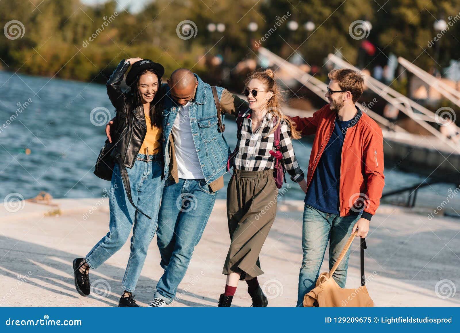 Group of Cheerful Multicultural Friends Walking Stock Image - Image of ...