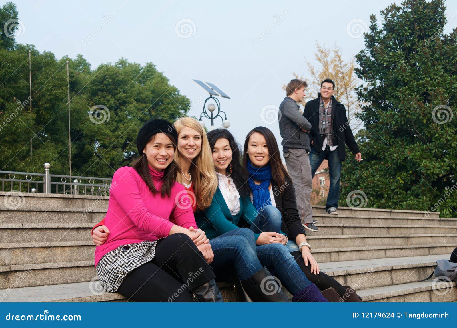 Multicultural Girls in College Stock Photo - Image of group, grass ...