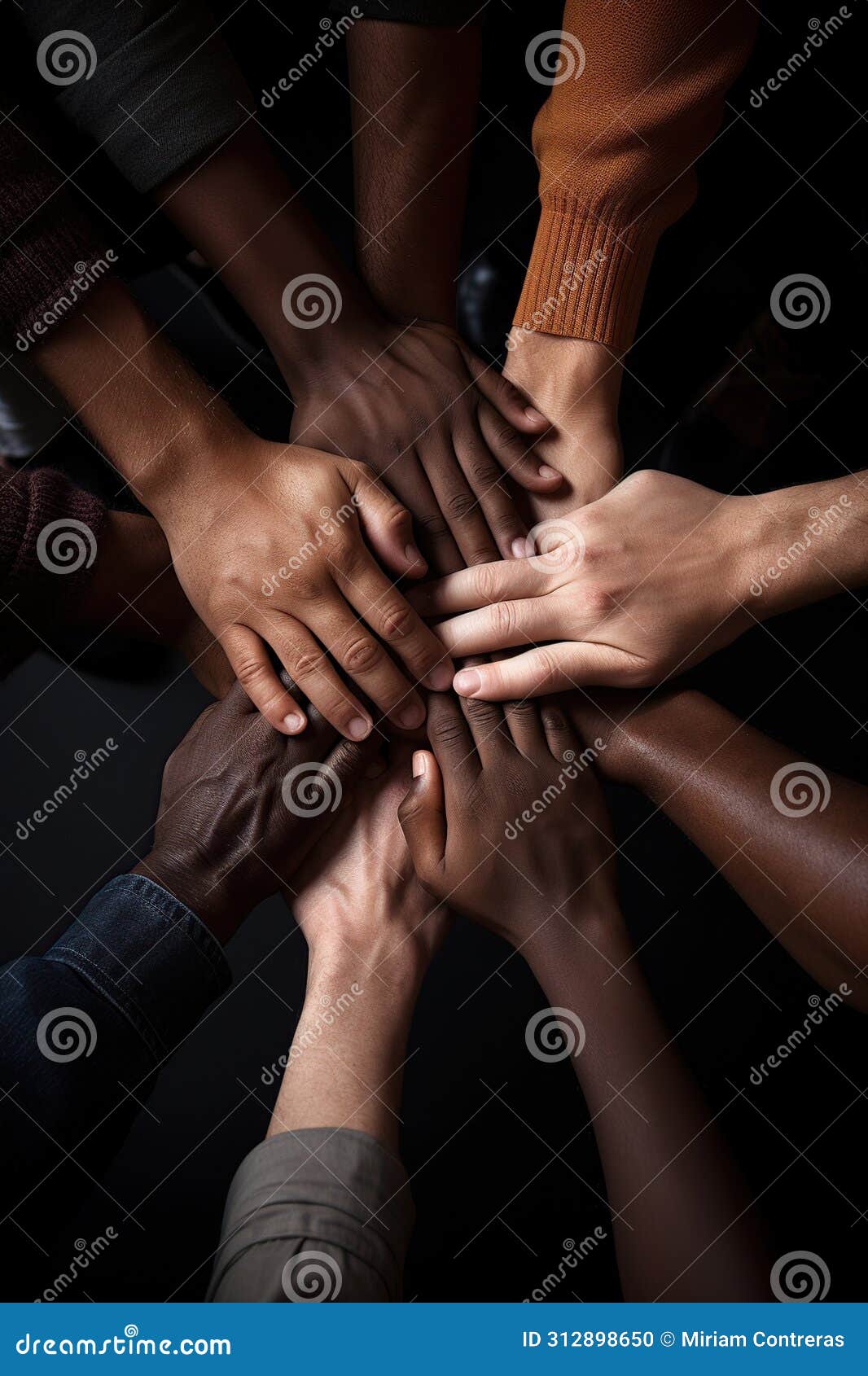Multicultural Group Placing Hands Together In A Symbol Of Unity And ...