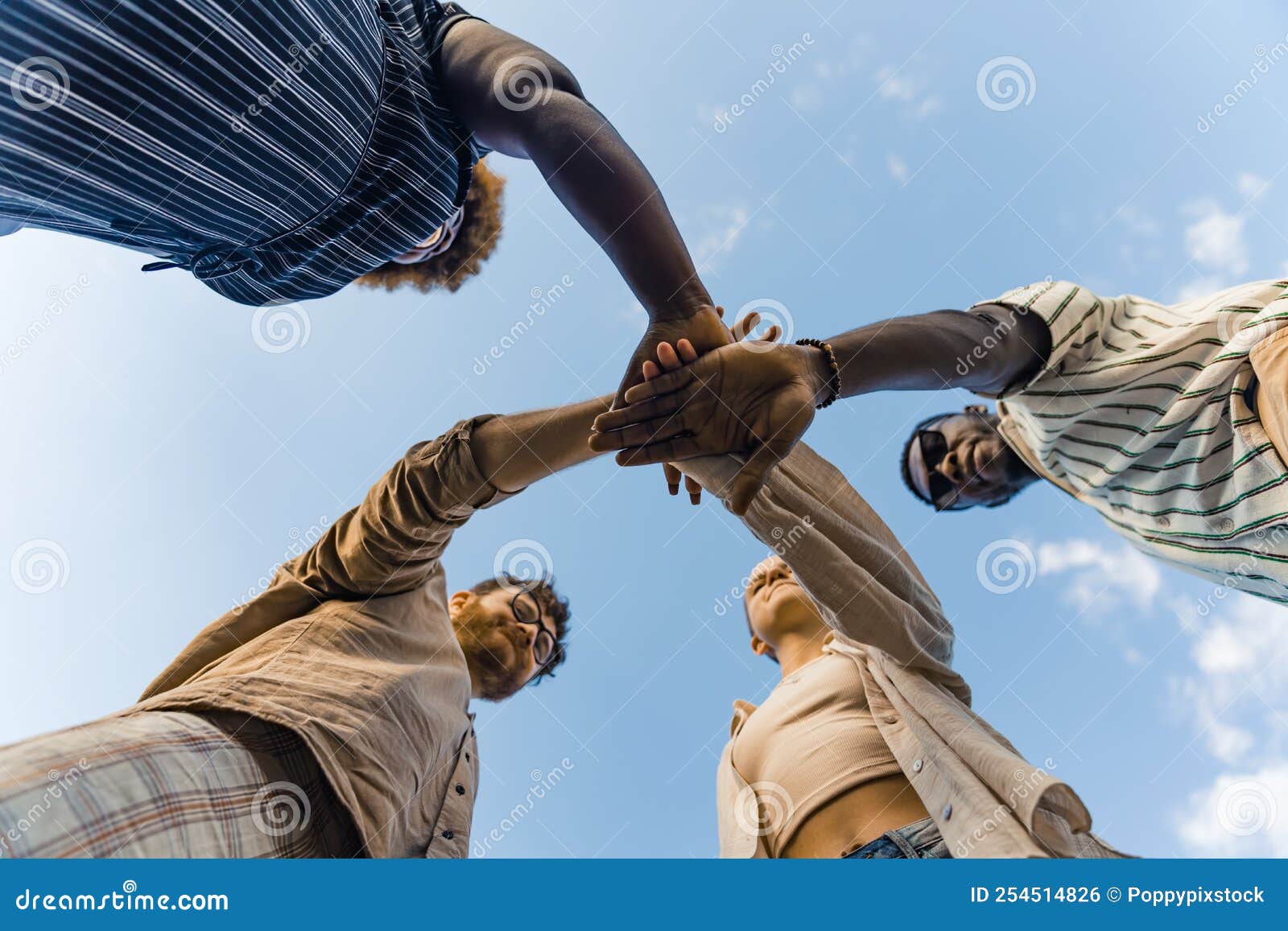 Multicultural Group of Young People Standing in Circle and Holding ...