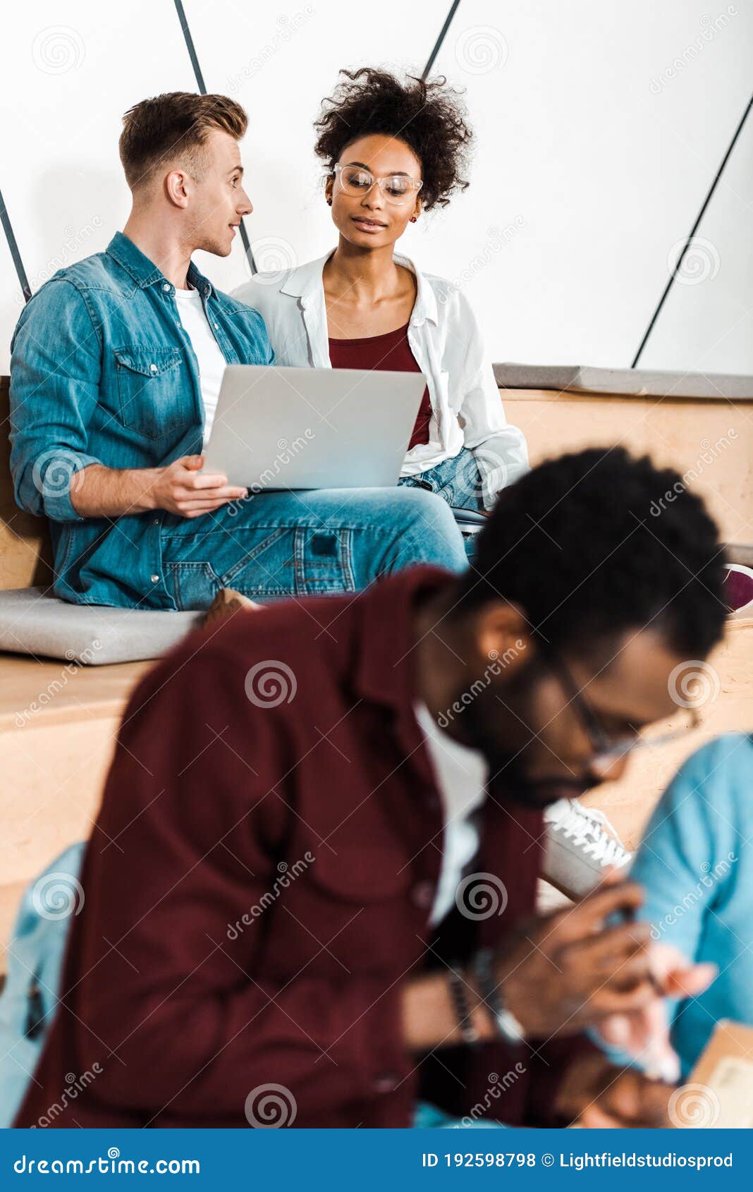 Multicultural Students in Glasses Using Laptop Stock Photo - Image of ...