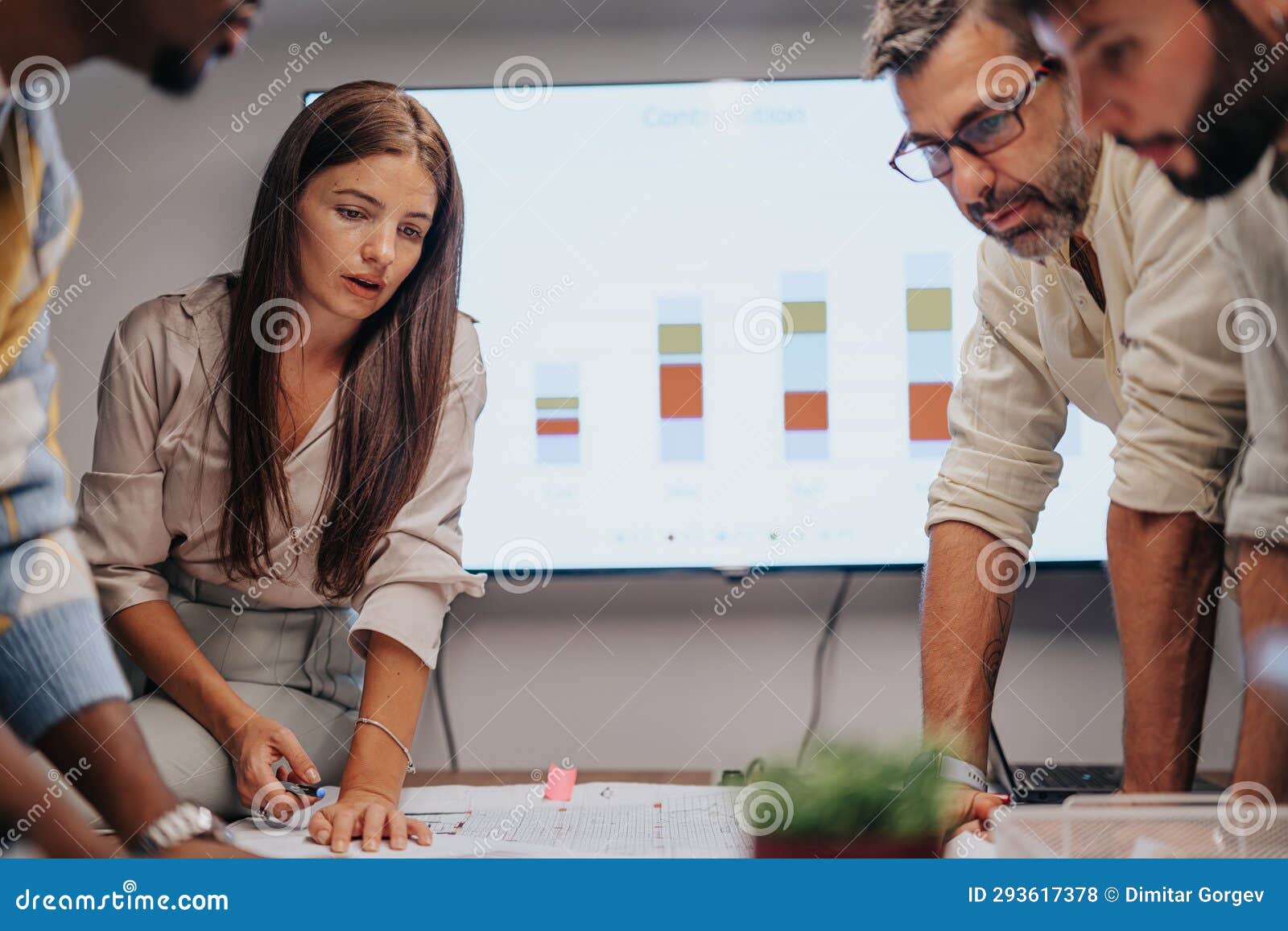 Multicultural Team of Engineers Collaborating in a Conference Room ...