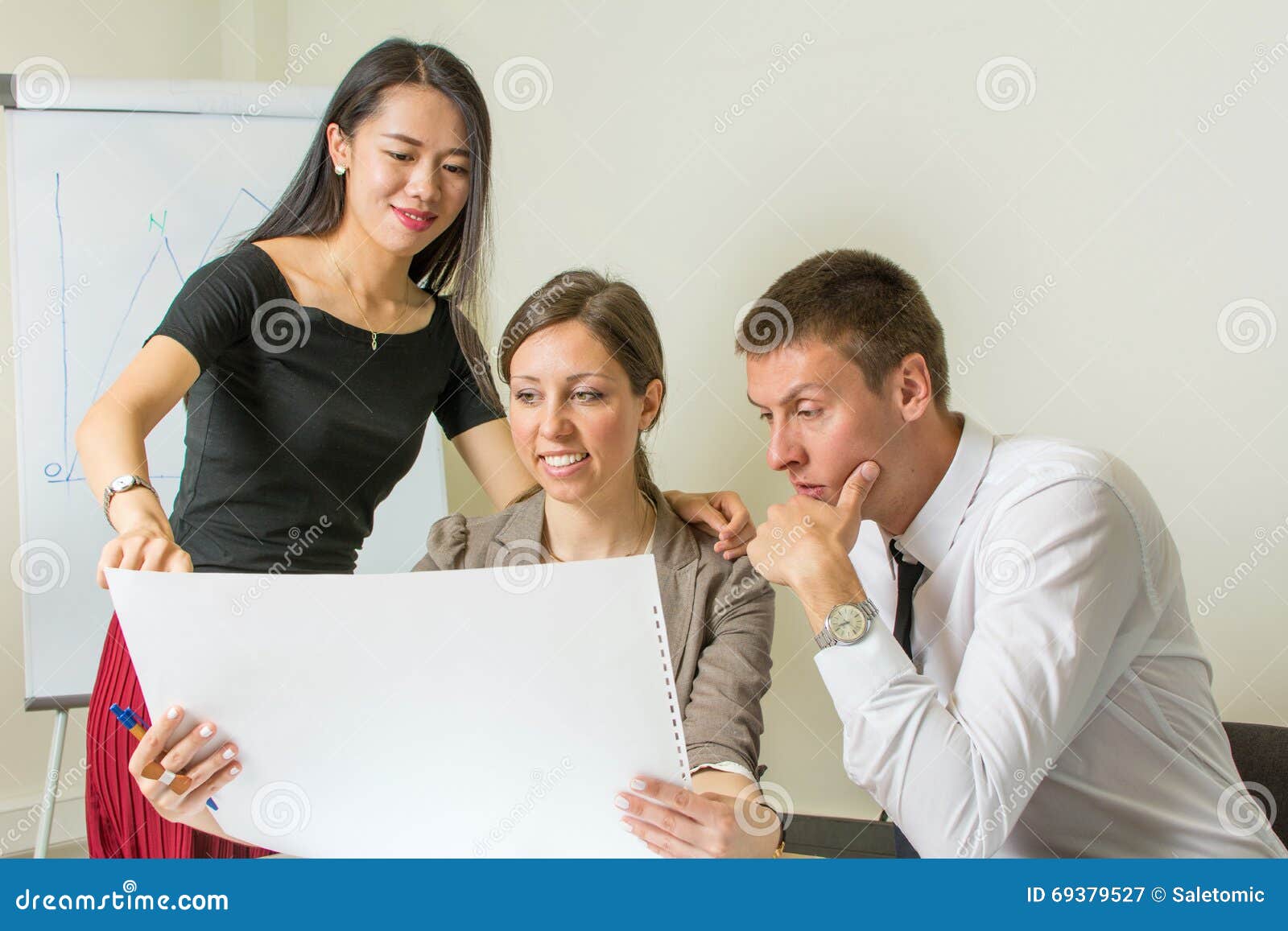 Multicultural Team Looking at a Project Stock Image - Image of modern ...