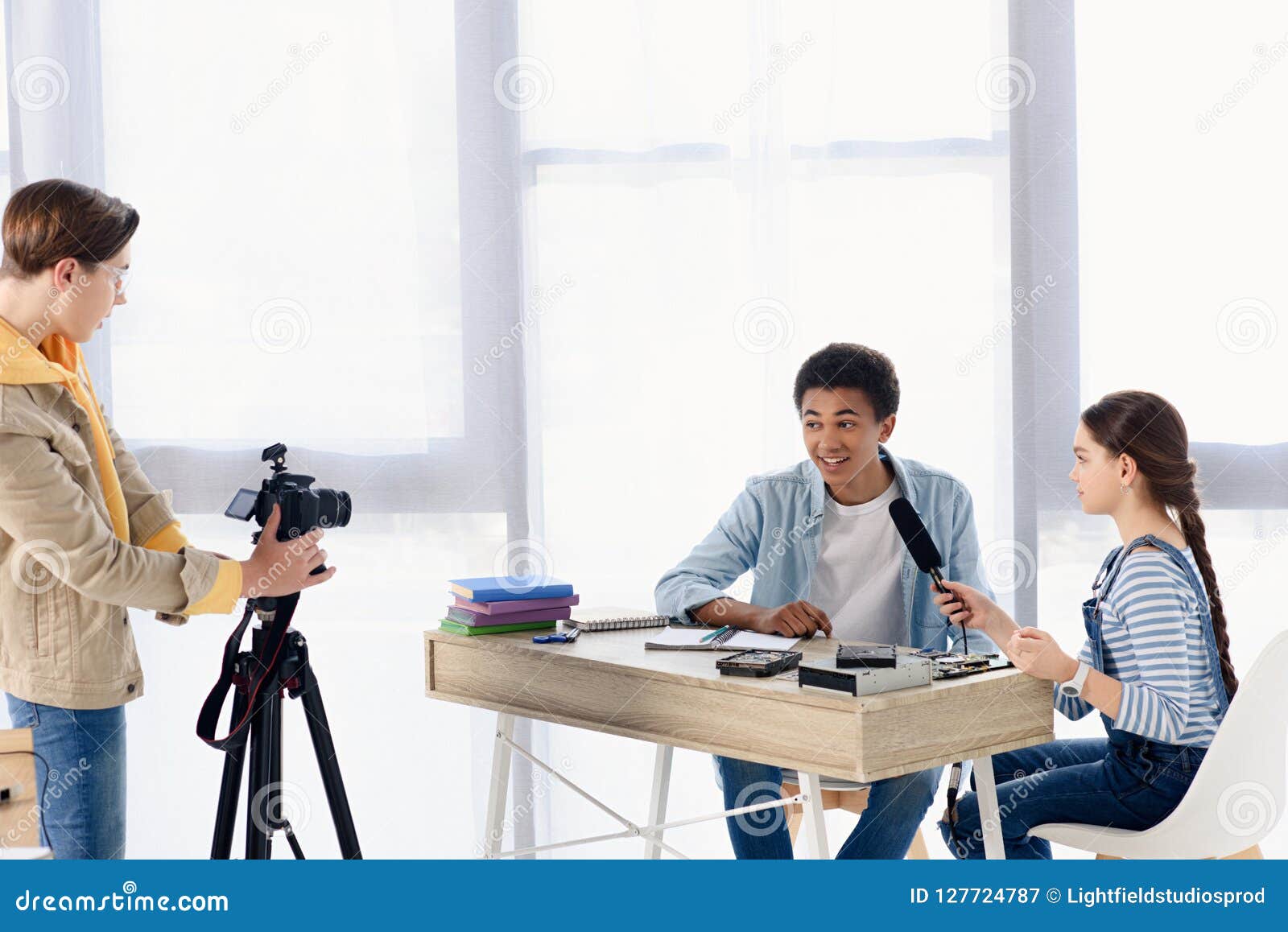 Multicultural Teenagers Shooting Video Blog about Engineering Stock ...