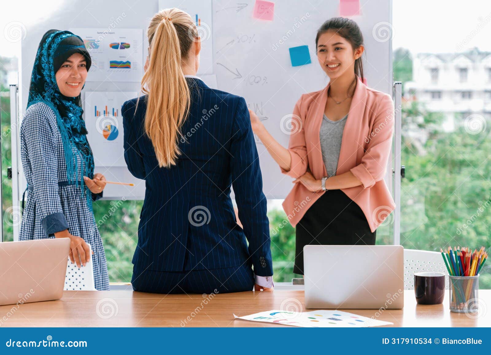 Multicultural Working Group in Teamwork Meeting. Uds Stock Photo ...