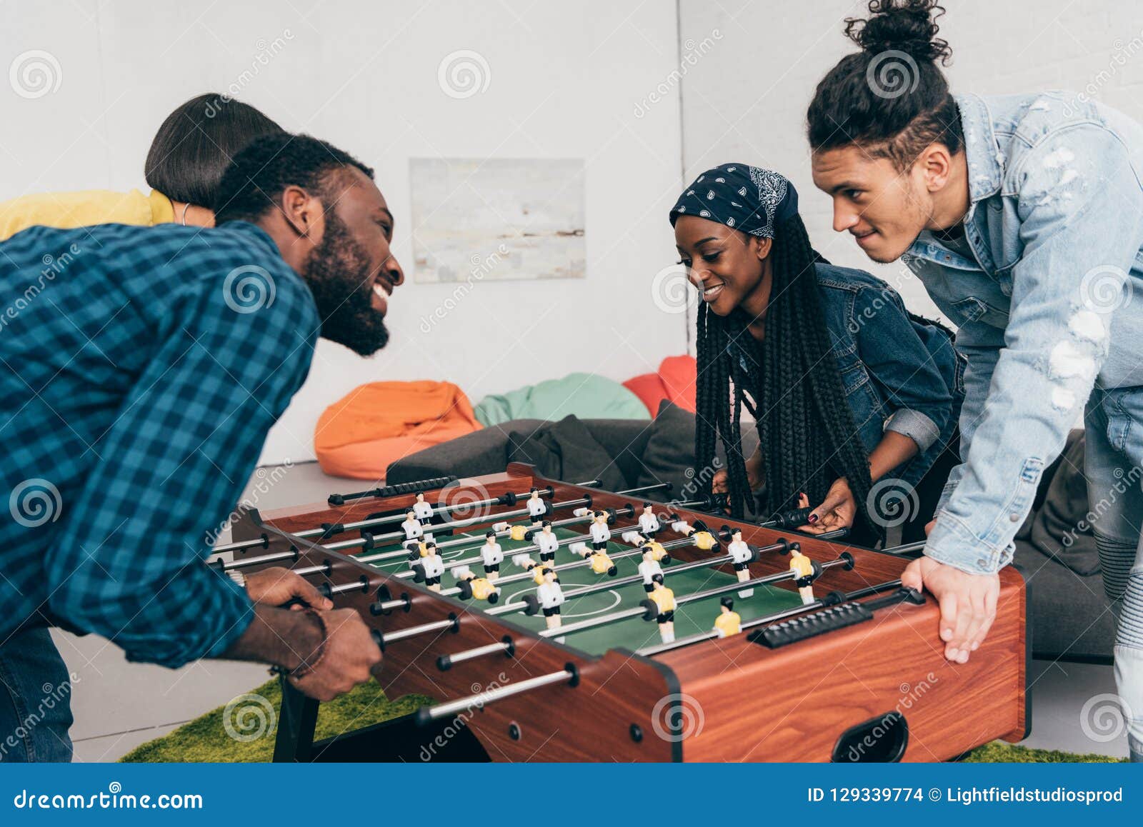 Multicultural Young Friends Playing Table Stock Photo - Image of ...