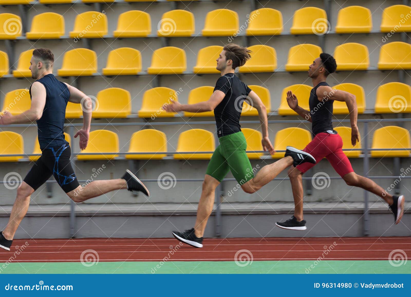 Multiethnic Athlete Group Run on Running Track Outdoors Stock Photo ...