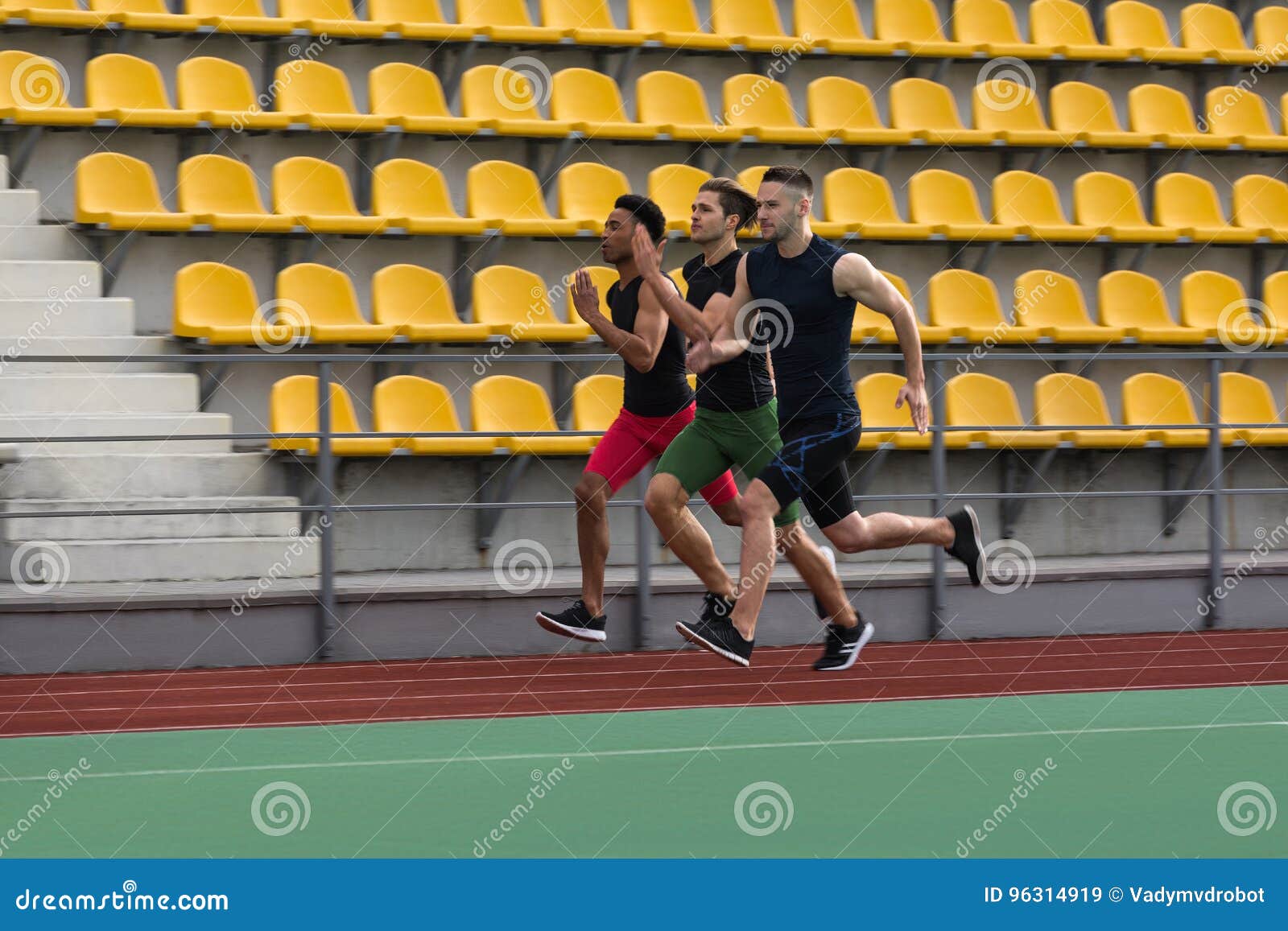 Multiethnic Athlete Group Run on Running Track Outdoors Stock Image ...