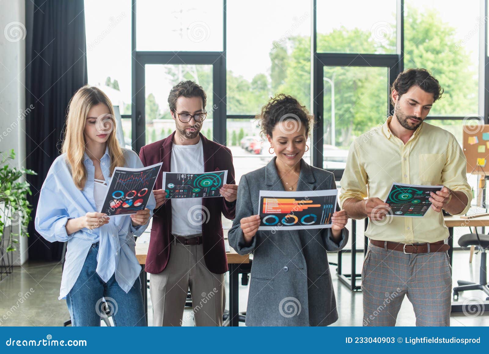 Multiethnic Business People Looking at Documents Stock Image - Image of ...
