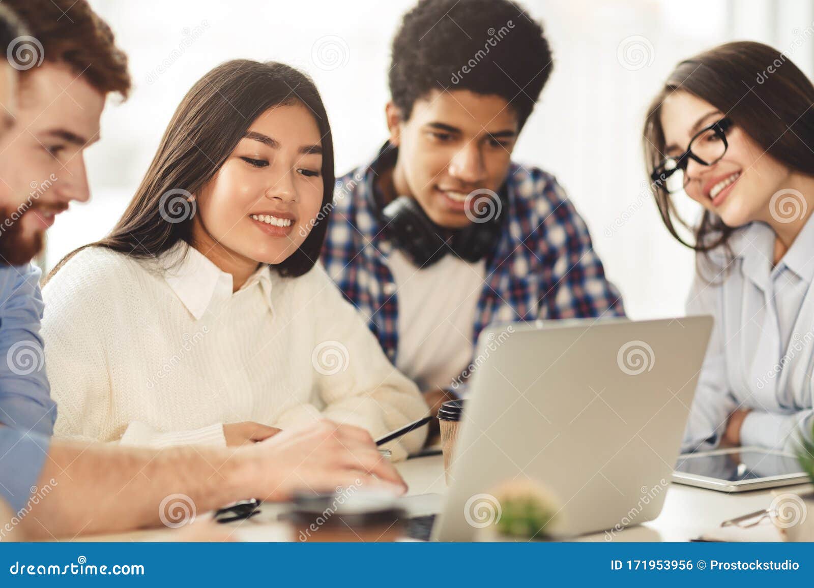 Multiethnic College Students Checking Test Results on Laptop Stock ...