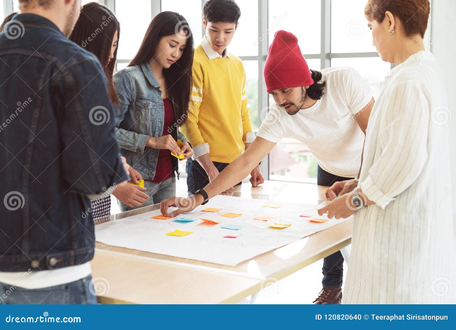 Multiethnic Creative Team Working Together, Meeting and Brainstorming ...