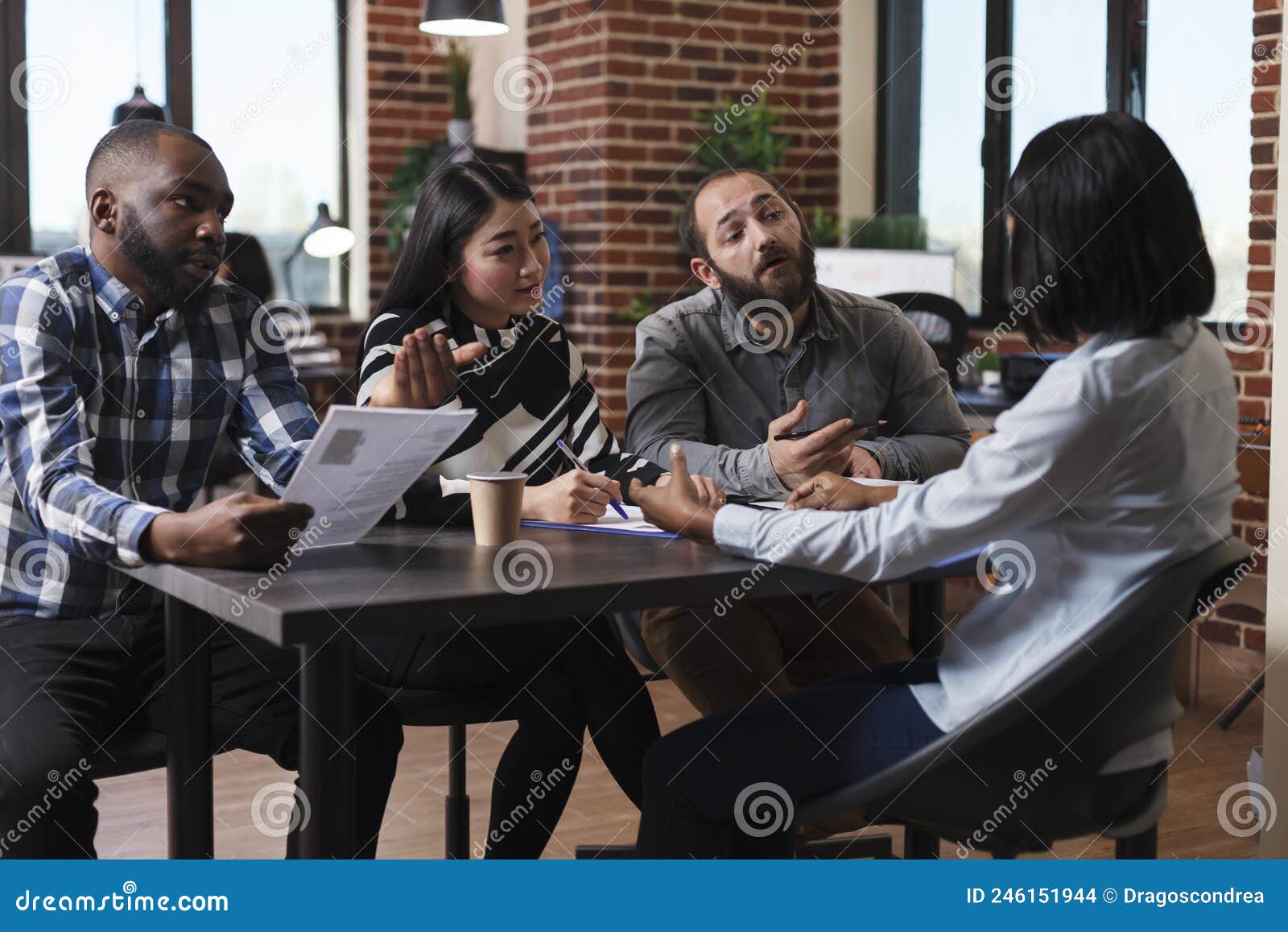 Multiethnic Executive Managers Interviewing African American Applicant ...