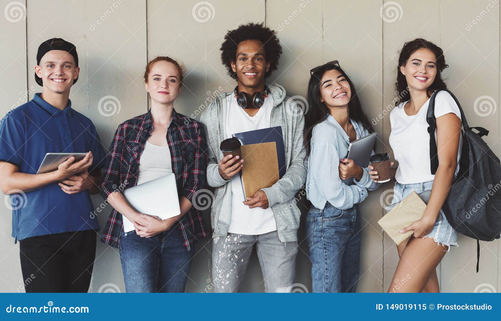 Multiethnic Group of Cheerful Young Students Standing Together Stock ... Multiethnic Group of Cheerful Young Students Standing Together Stock ...