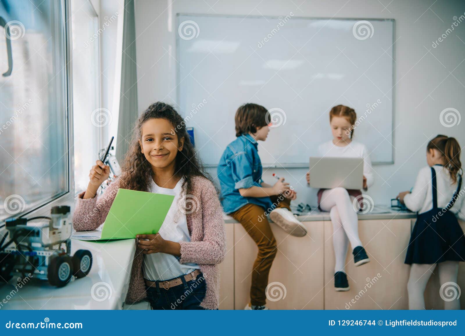 Multiethnic Group of Little Kids Working Together Stock Photo - Image ...