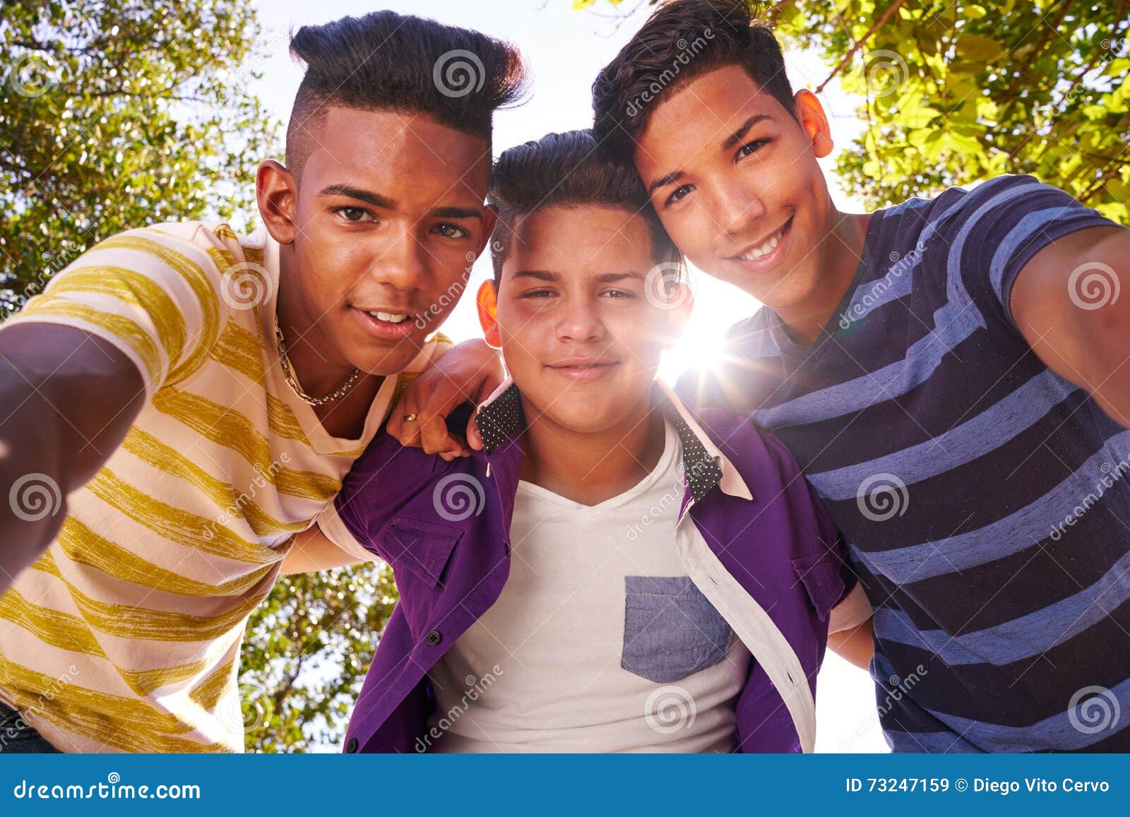 Multiethnic Group of Teenagers Embracing Smiling at Camera Stock Image ... Multiethnic Group of Teenagers Embracing Smiling at Camera Stock Image ...