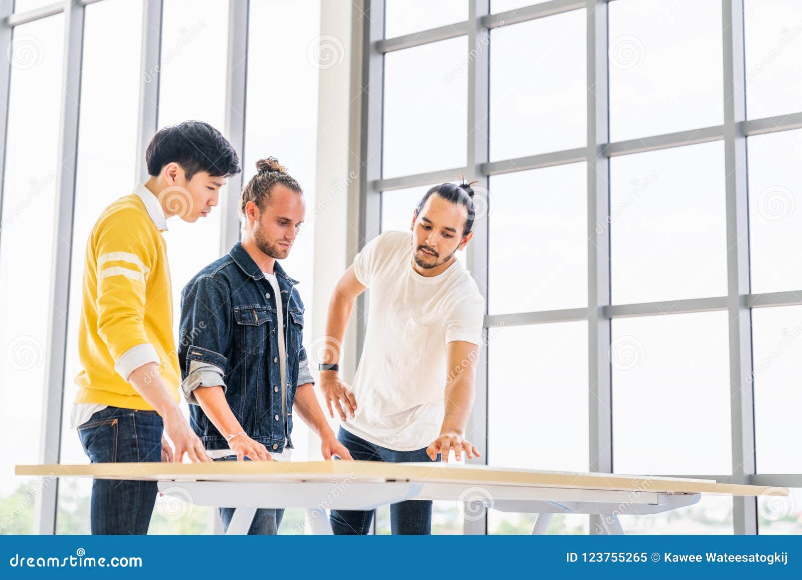 Multiethnic Group of Three Men Meeting Discuss Brainstorm Project Plan ...