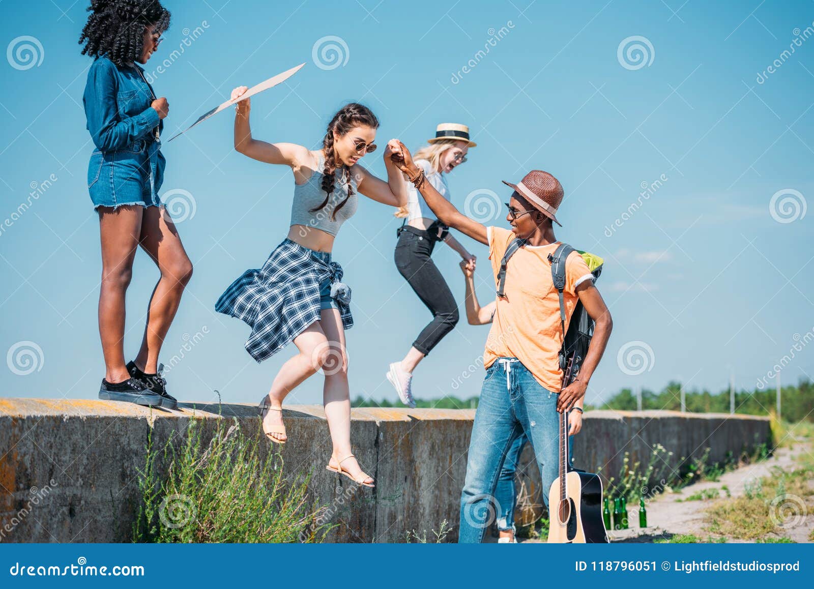 Multiethnic Group of Young Friends Jumping of Stock Image - Image of ...