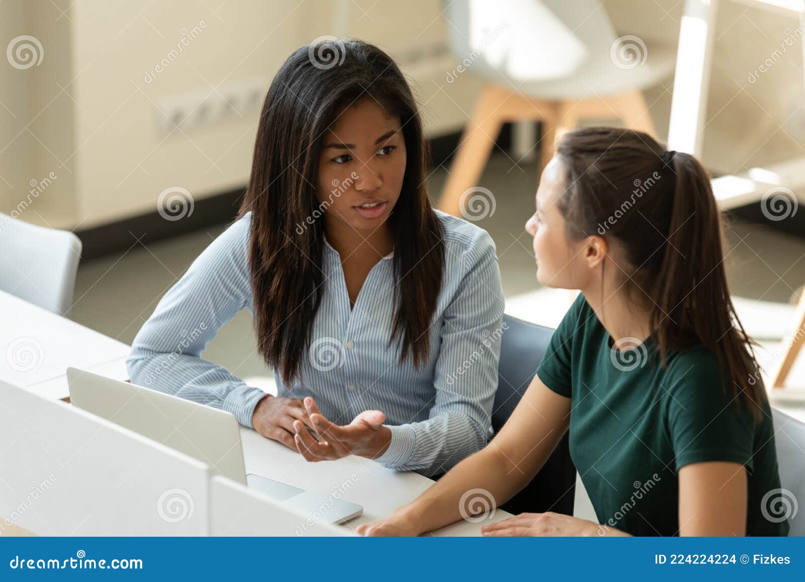 Multiethnic Interns Girls Discussing and Completing Training Task at ...