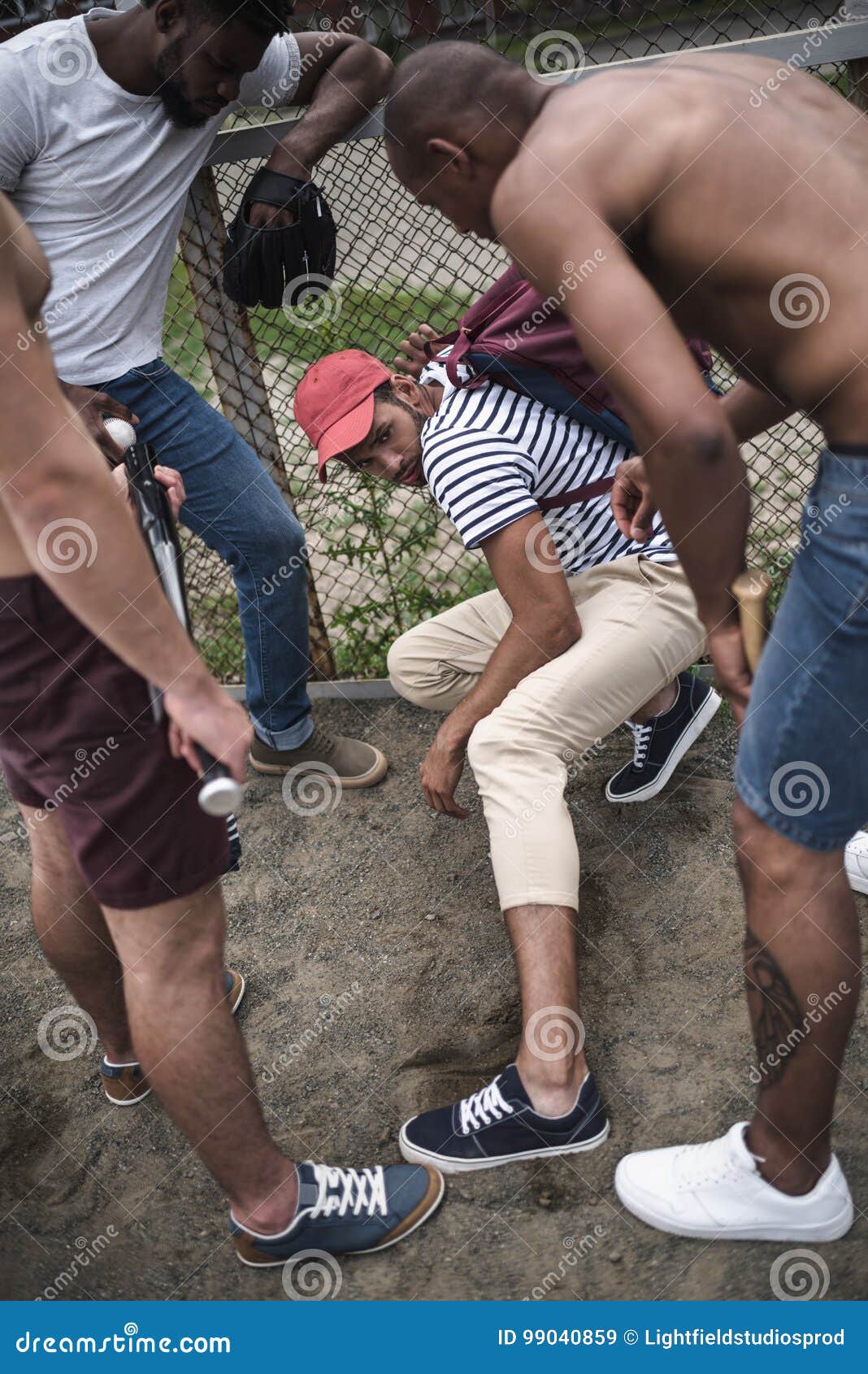 Multiethnic Men Attacking Other One with Baseball Bats Stock Image ...