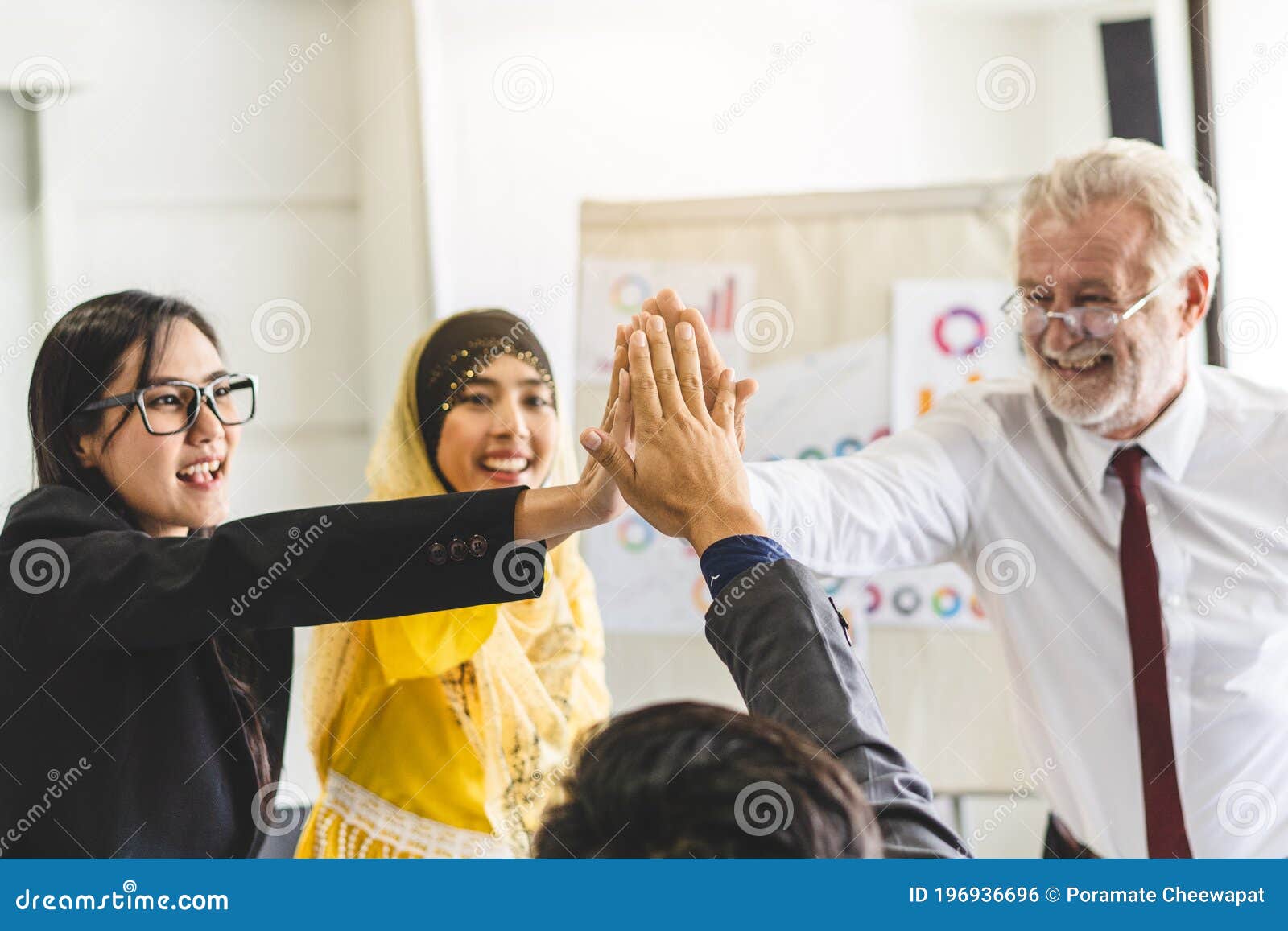 Multiethnic Office Worker Doing High Touch Hands Celebration after ...