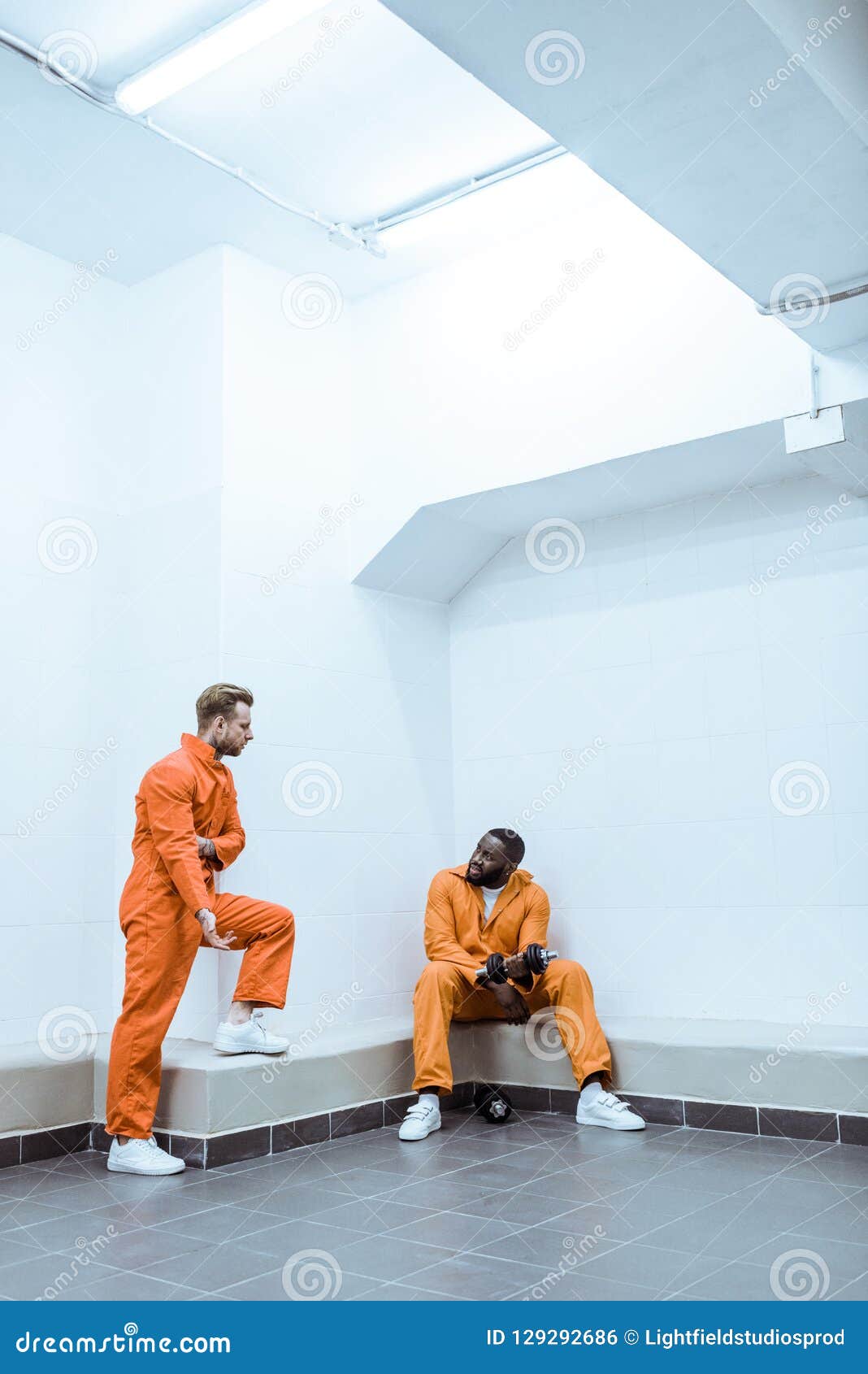 Multiethnic Prisoners in Light Modern Stock Photo - Image of light ...